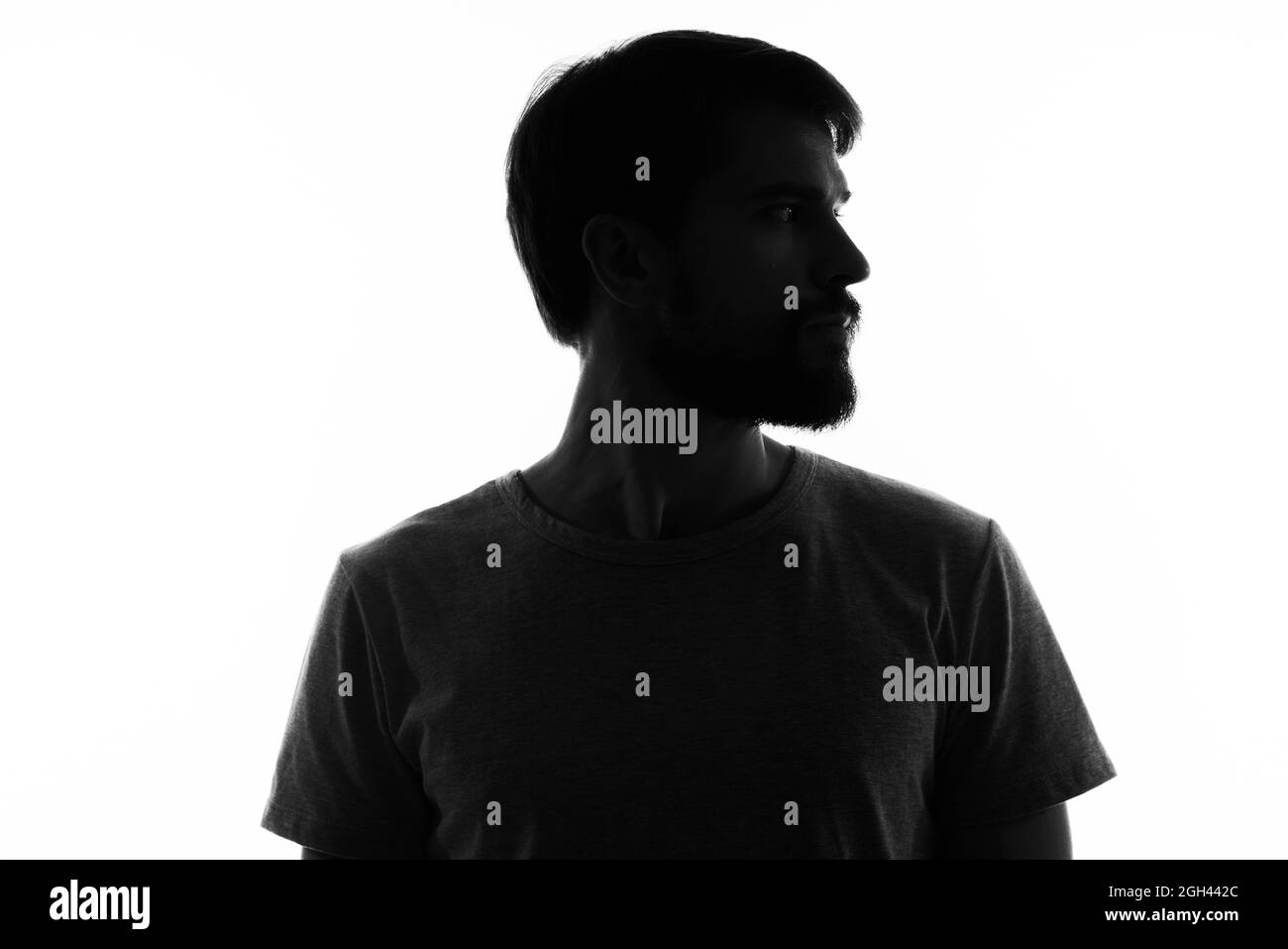 bearded man in the shadows anonymity studio mystic Stock Photo - Alamy