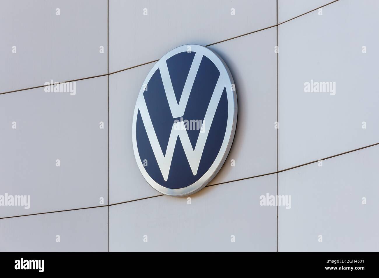 round volkswagen logo on outside white building wall at daylight - Tula ...