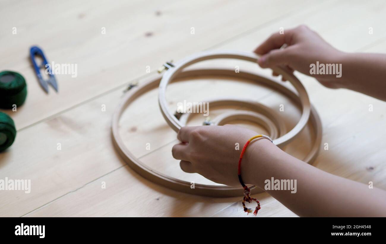 Embroider sewing by woman hand. Craft work and female hands. Handicraft ...