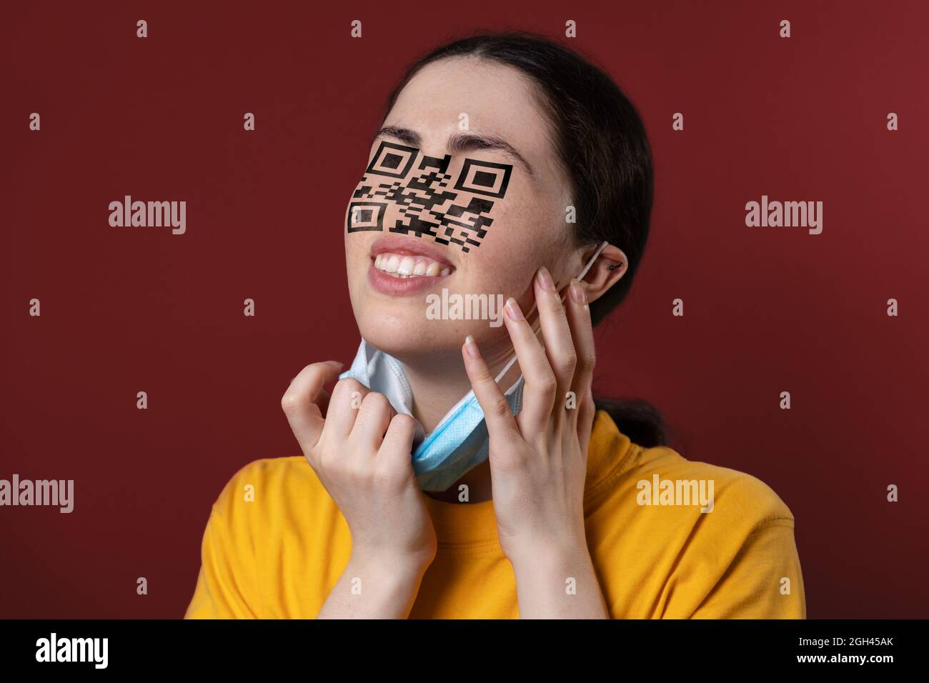 Portrait of a woman with a QR code instead of eyes and nose, removing ...