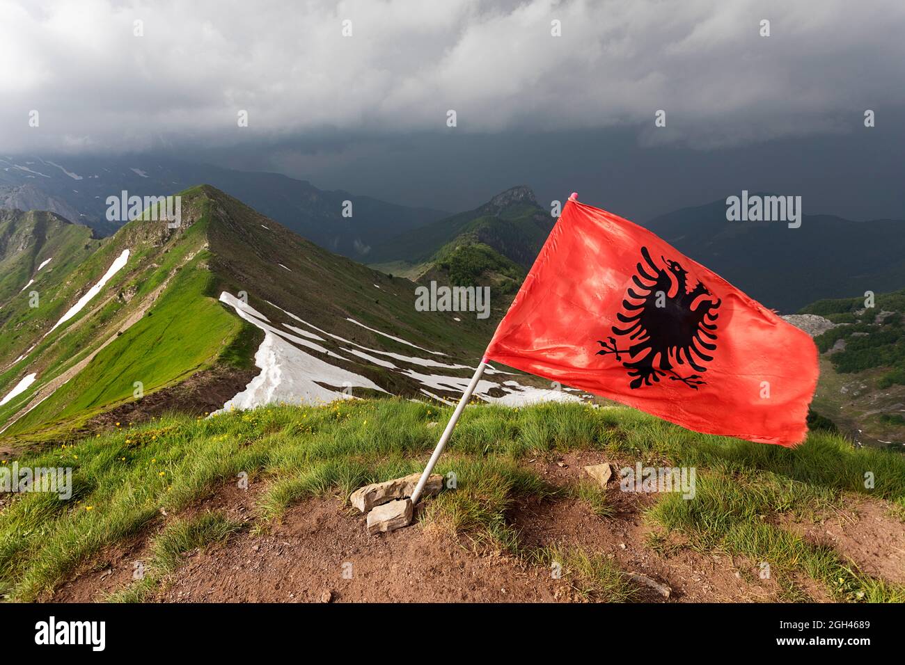 Albanian national flag on top of Maja e Vajushës peak (talijanka peak ...