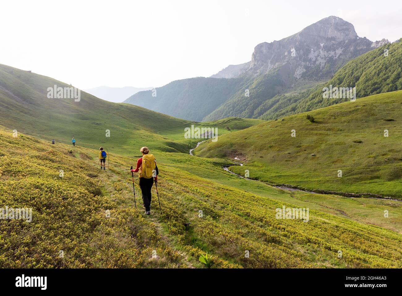 Mother and son, tourists, hikers exploring The Accursed Mountains ...