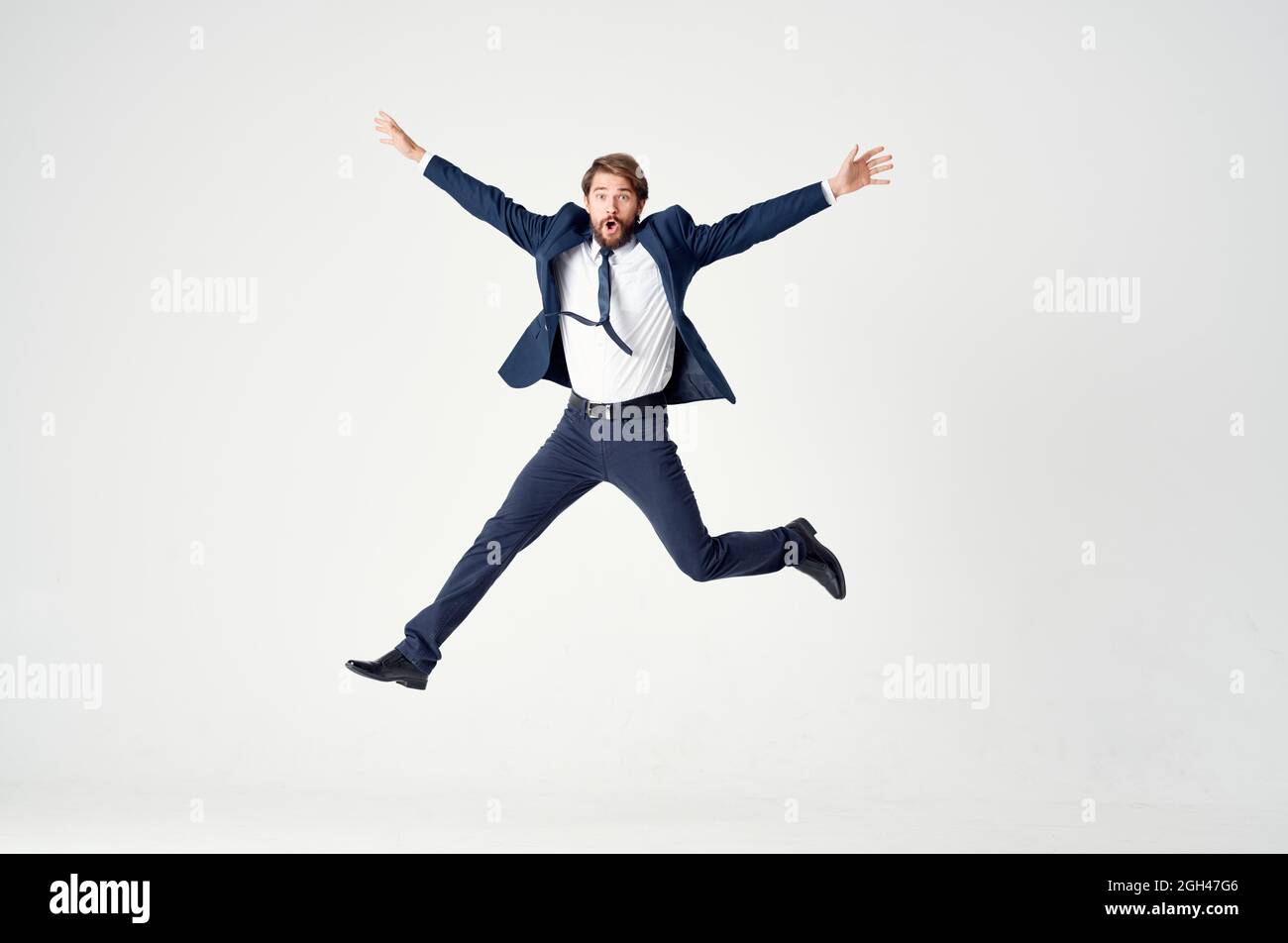Man in tuxedo jump hi-res stock photography and images - Alamy