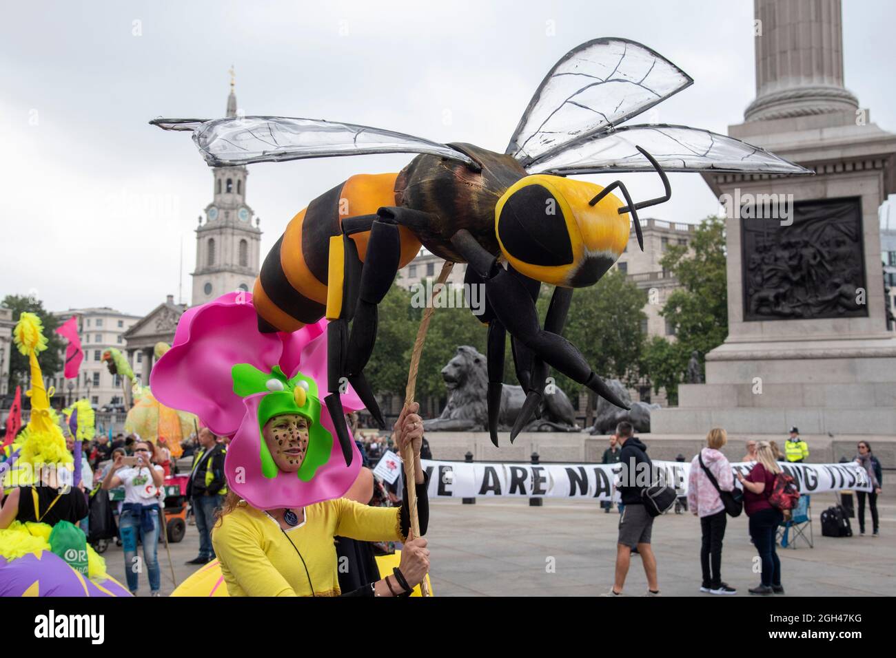 London, UK. 04th Sep, 2021. A woman holds a model of a giant wasp ...