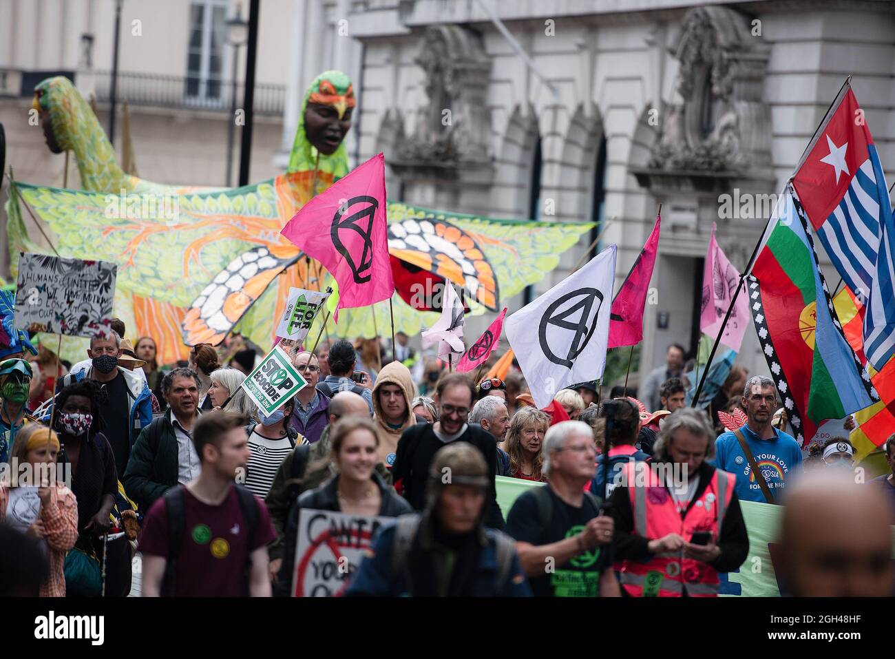 London, UK. 04th Sep, 2021. Activists march with flags and placards ...