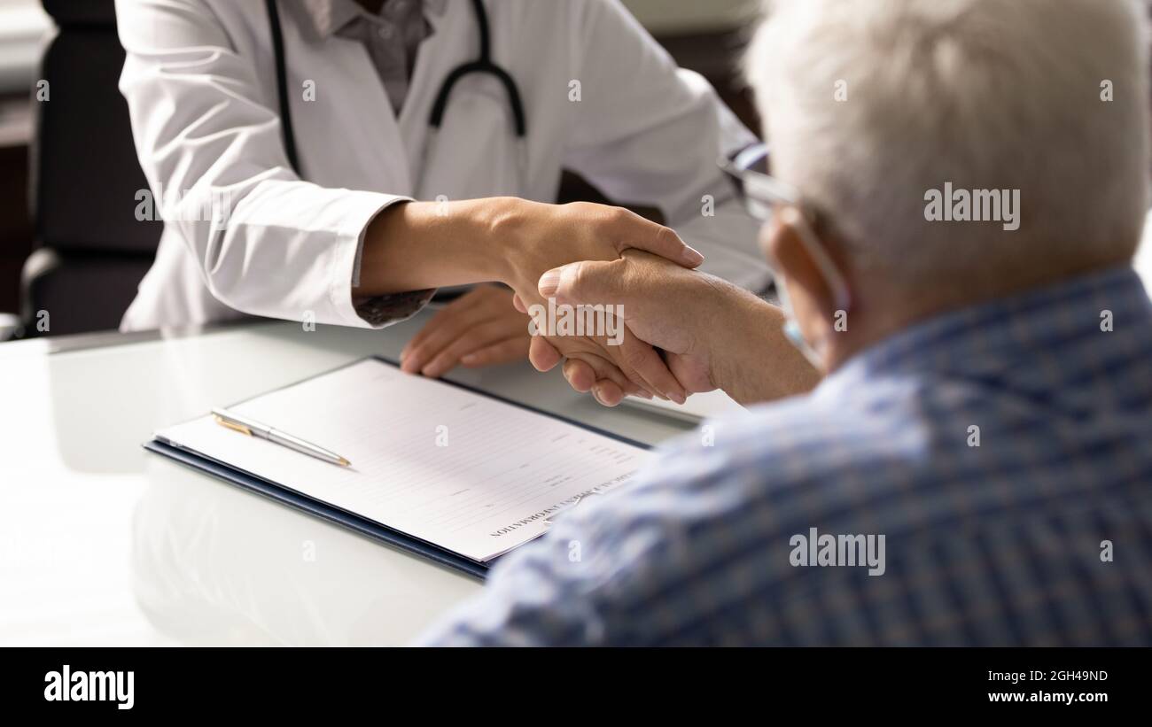 Doctor visiting man hi-res stock photography and images - Alamy