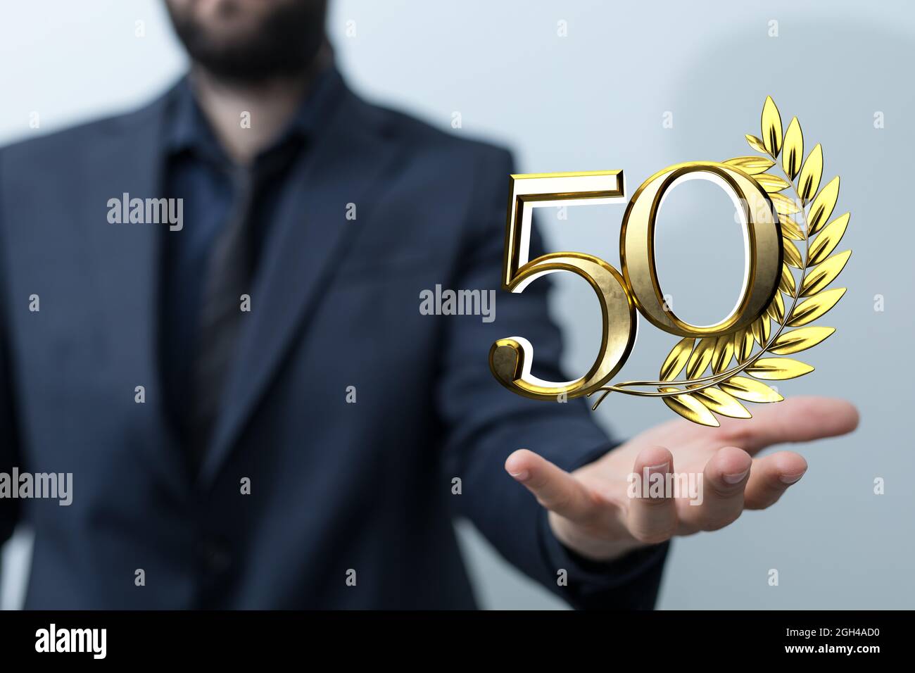 A digital 50 years anniversary award in a hand Stock Photo - Alamy