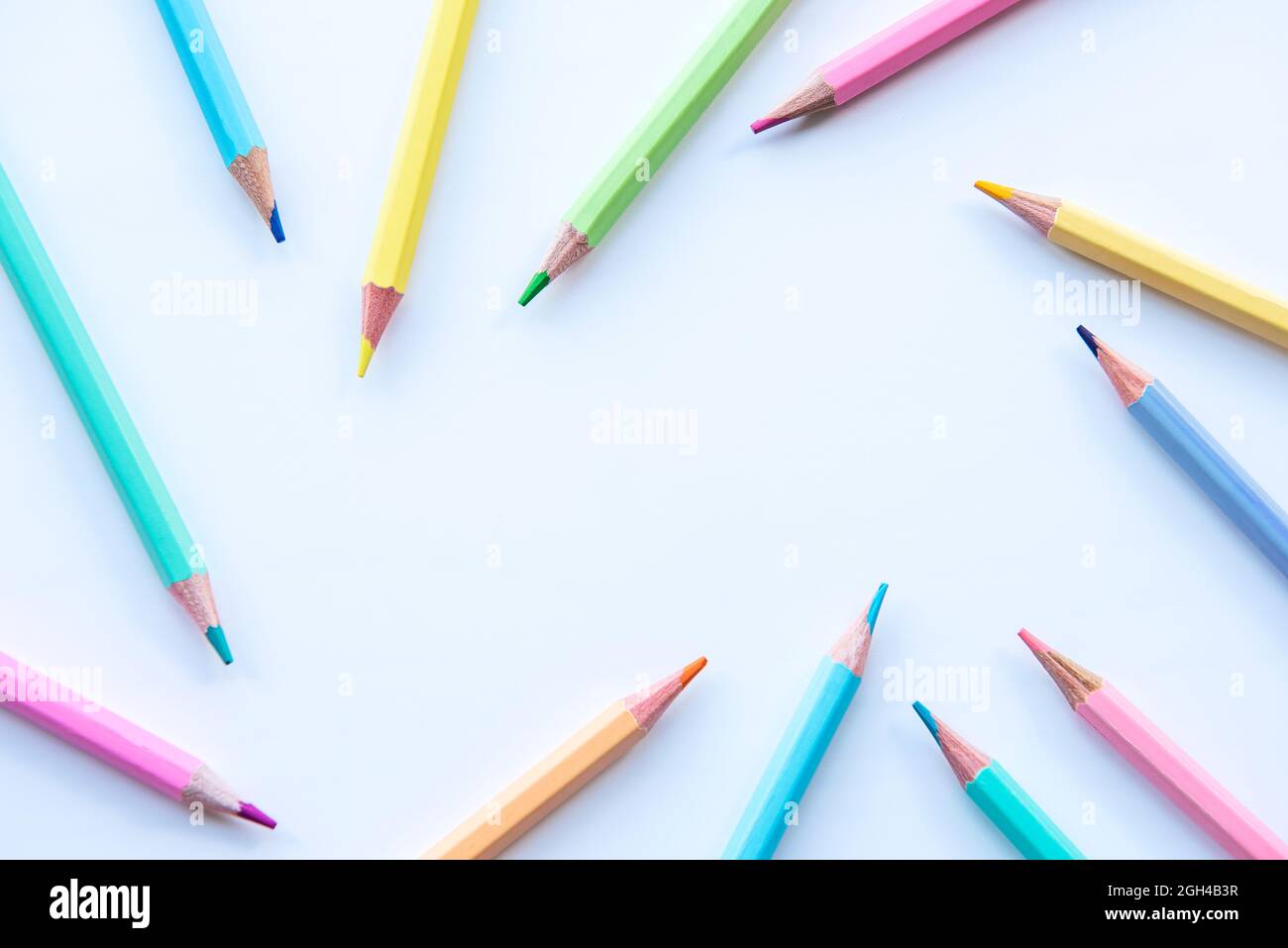 Back to school concept. Color pencils on white background Stock Photo ...