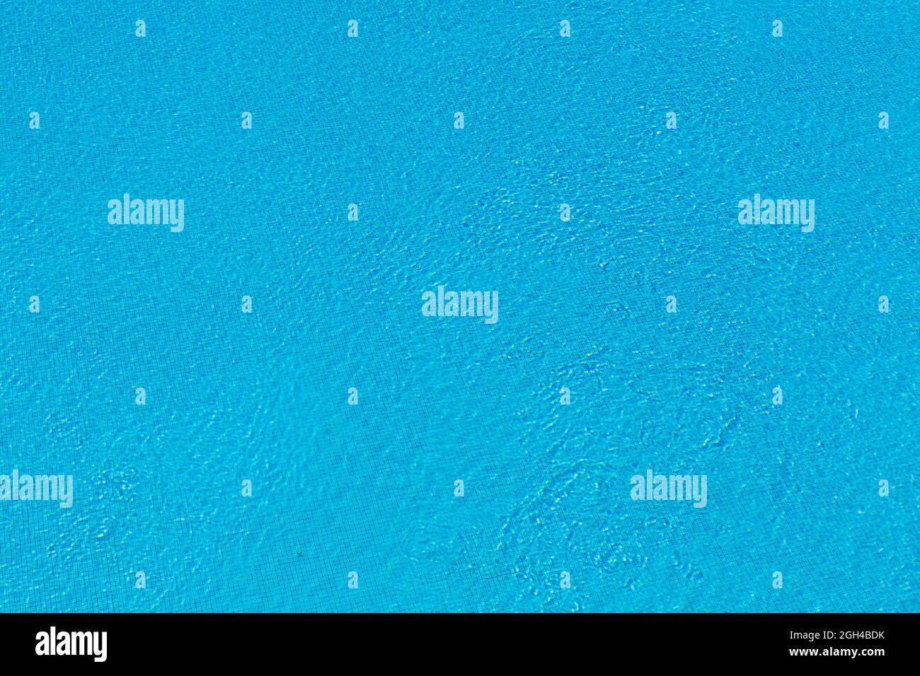 Beautiful refreshing blue swimming pool water Stock Photo - Alamy