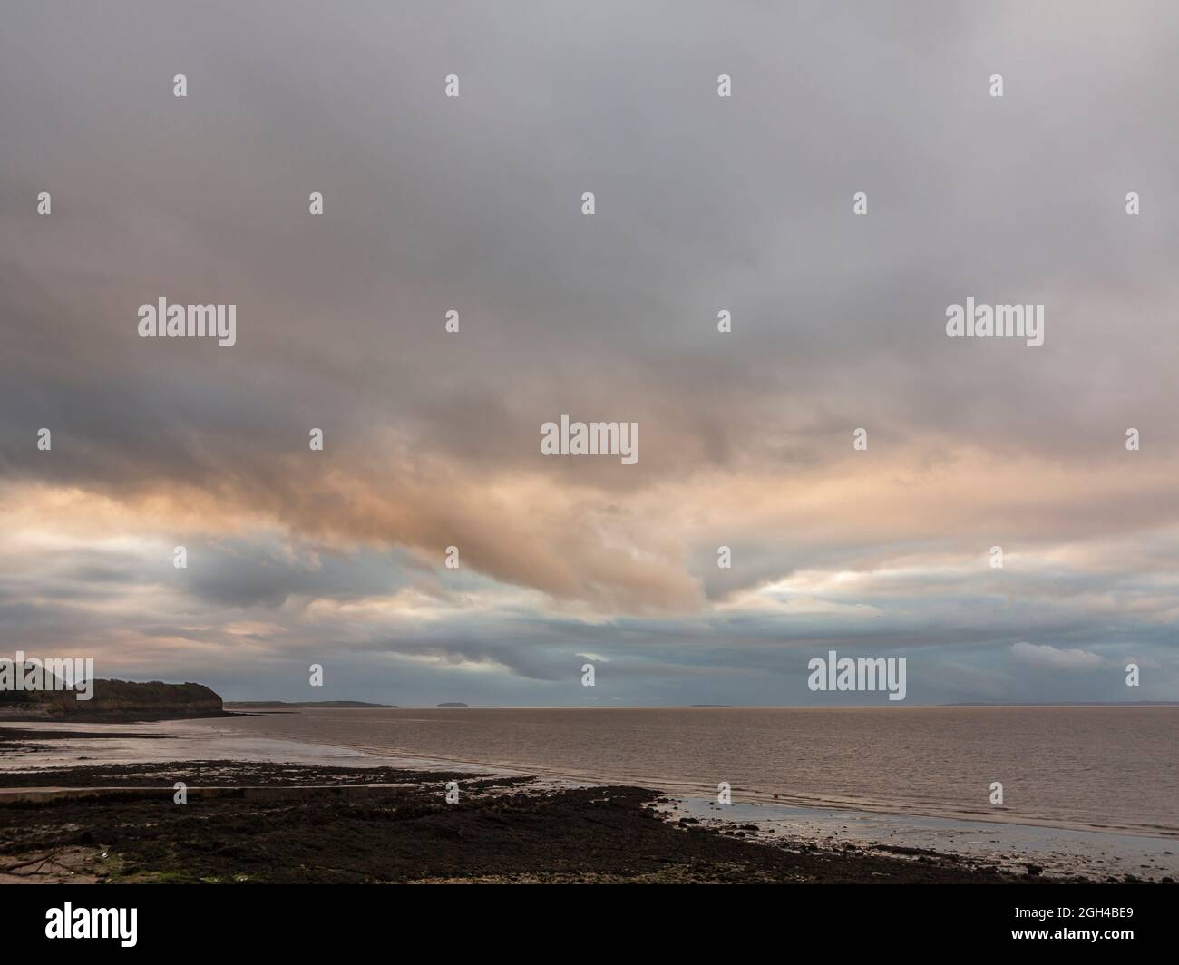 Clevedon seafront with dark clouds overhead Stock Photo - Alamy