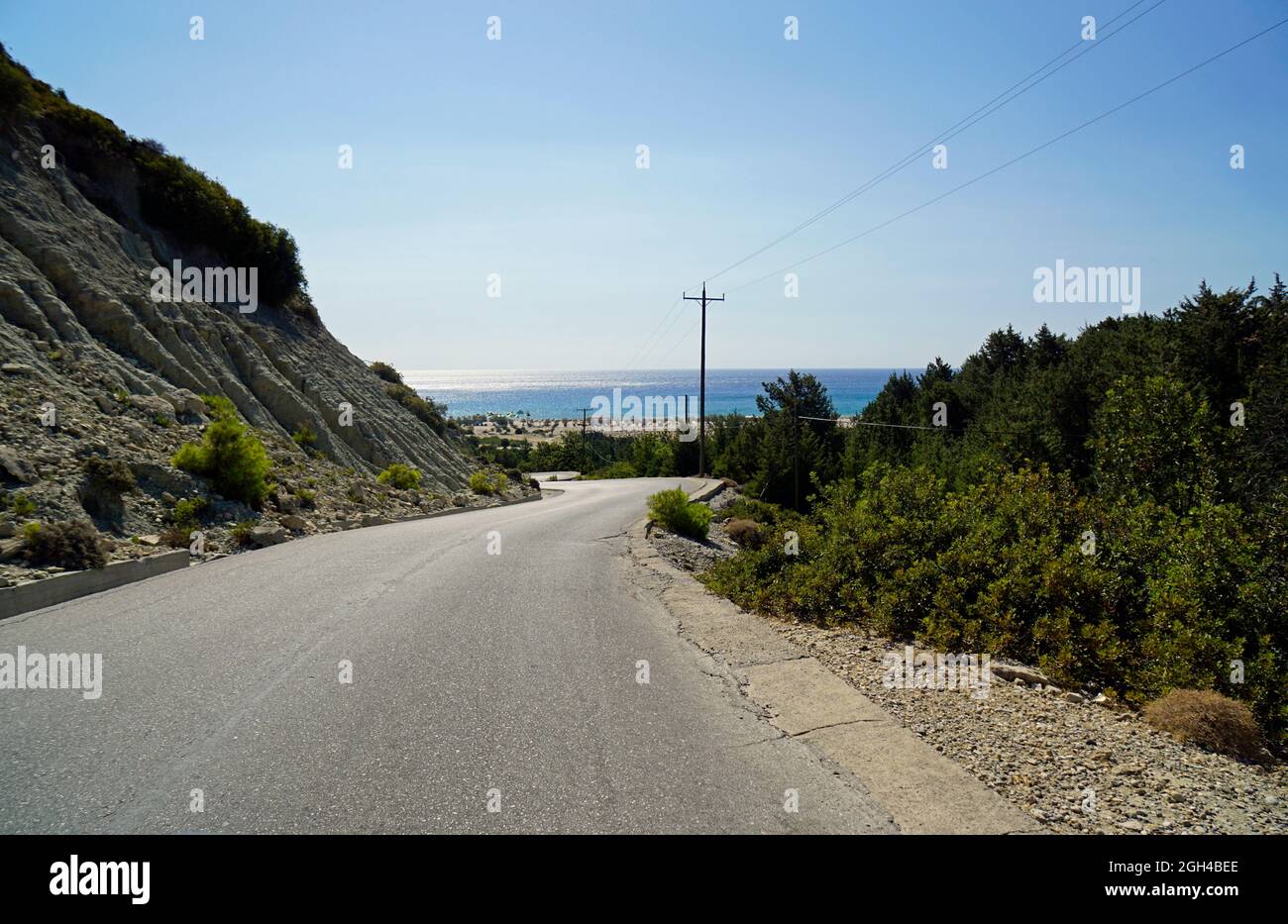traganou beach road on rhodes in greece Stock Photo - Alamy
