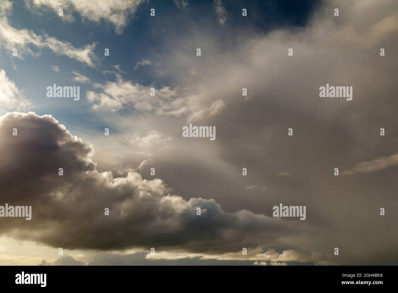 Cumulus clouds rolling in Stock Photo - Alamy