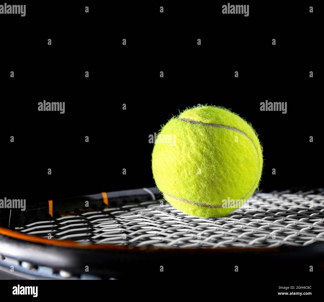 Strings of tennis racket and yellow ball hi-res stock photography and ...