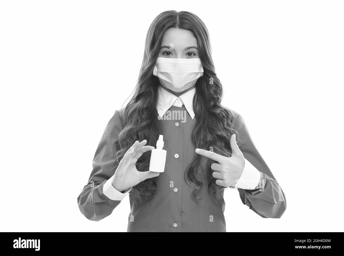 kid in respirator mask with nasal drop or spray for treatment of runny ...