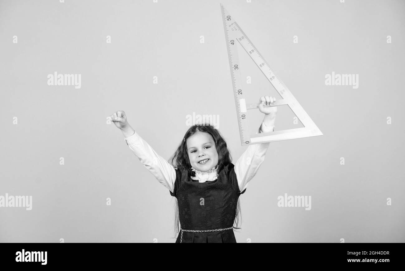 School student study geometry. Kid school uniform hold ruler. School ...