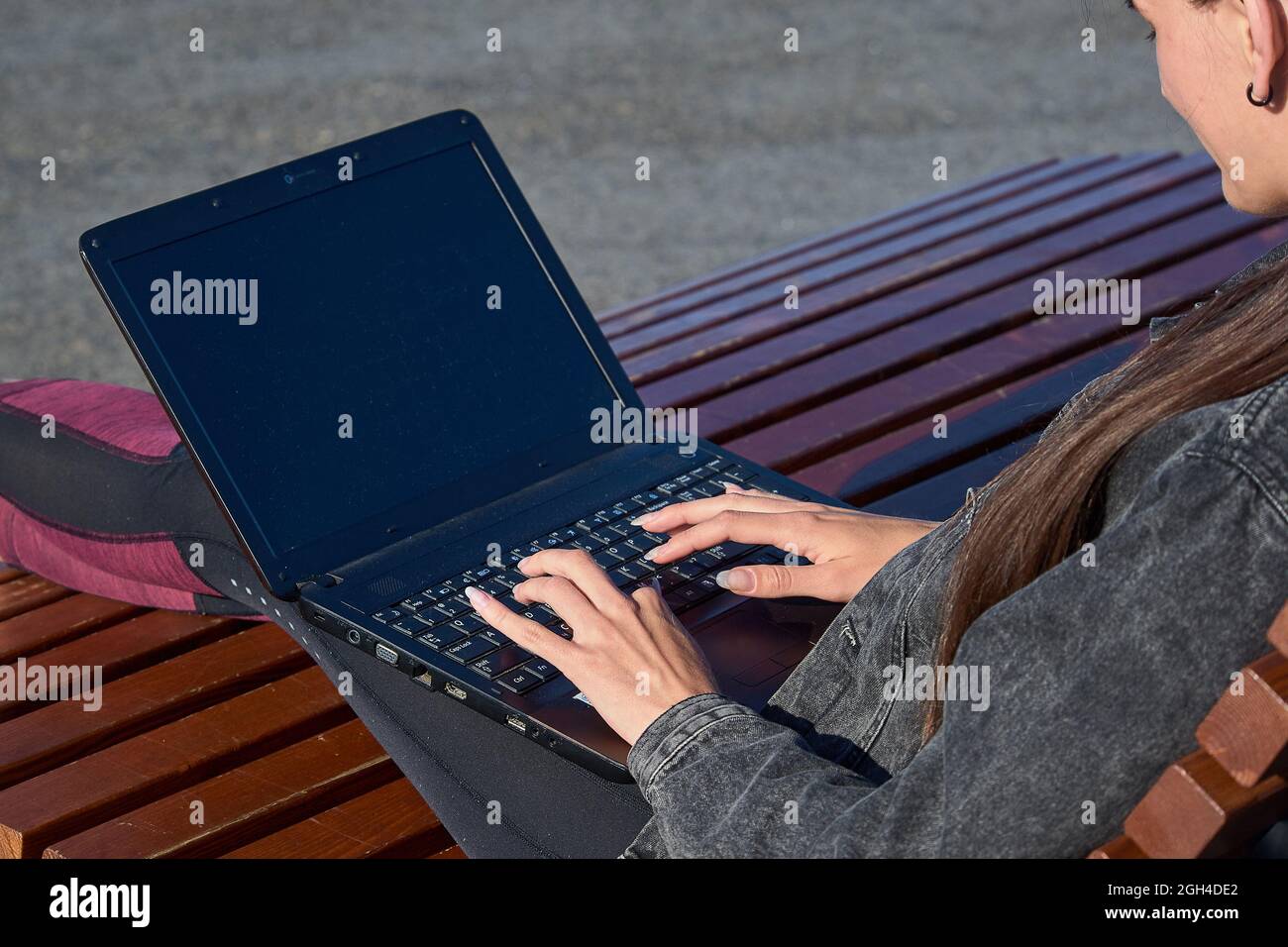 Female hands typing laptop keyboard close up Stock Photo - Alamy