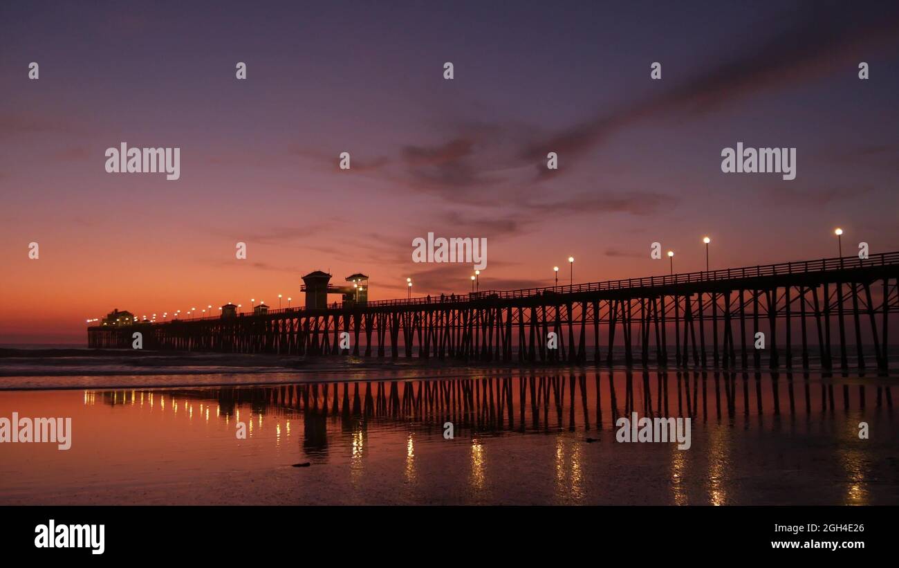 Pier silhouette Oceanside California USA. Pacific ocean tide tropical ...