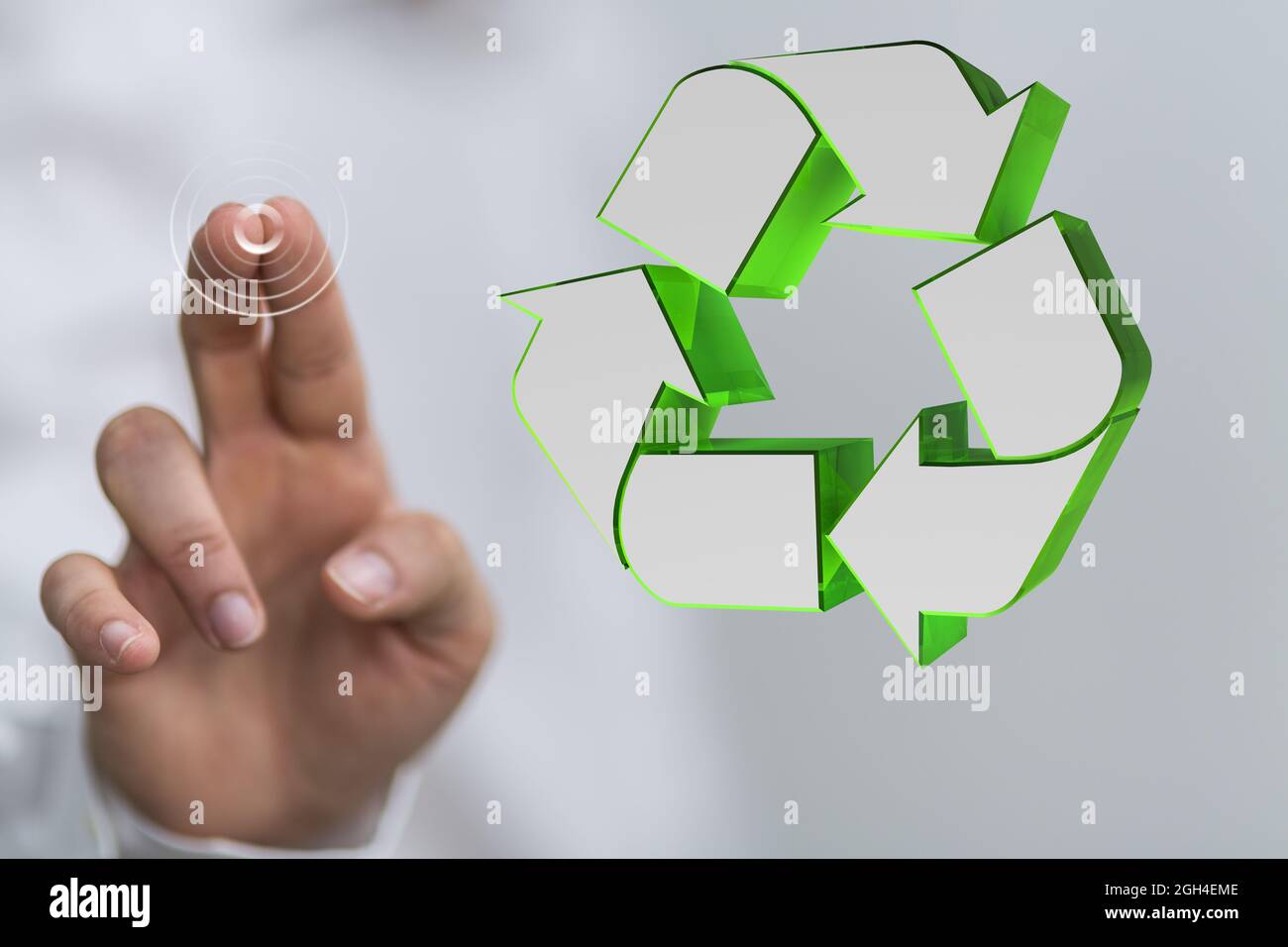 An illustration of a digital green recycling icon in a hand Stock Photo ...