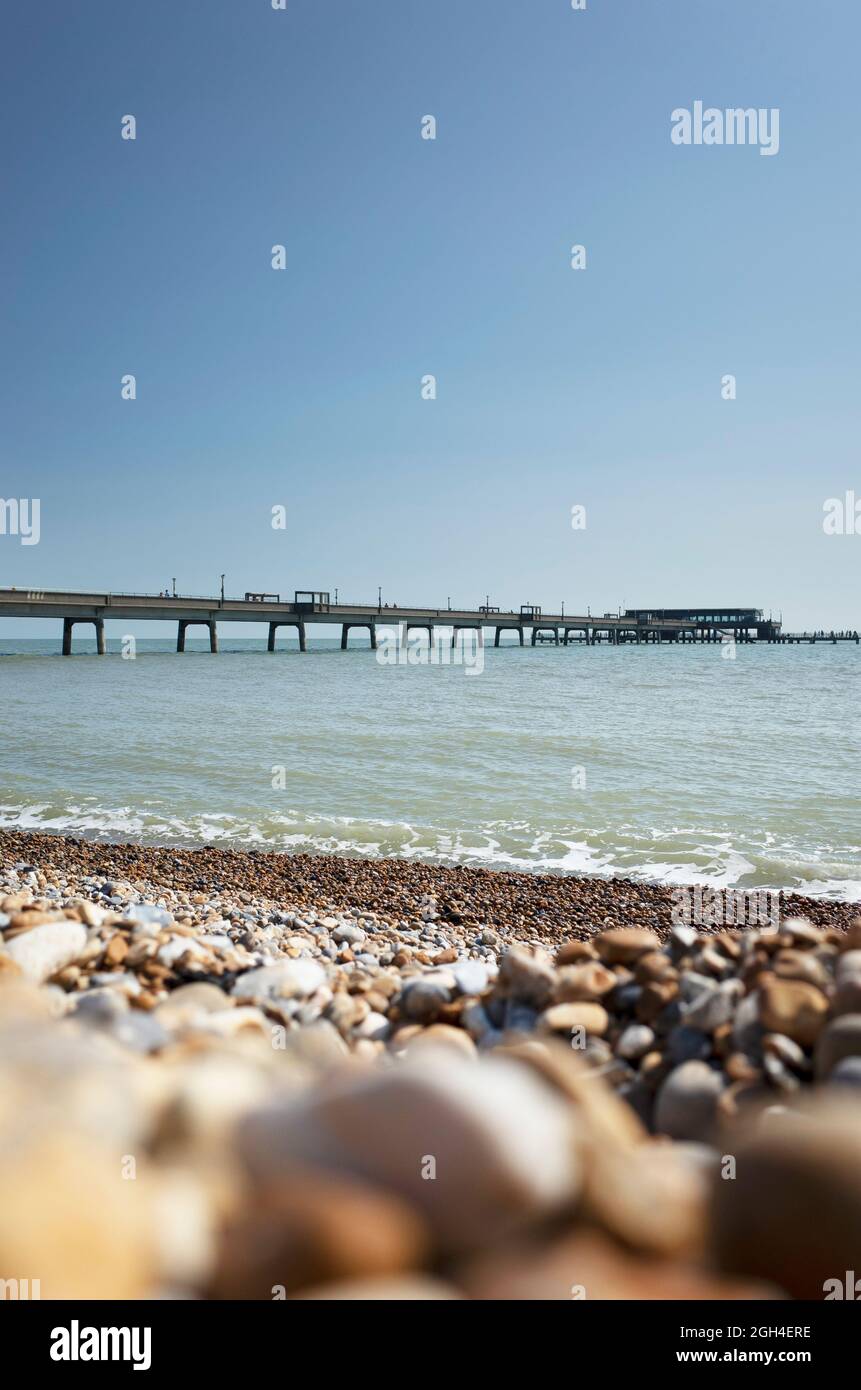View of Deal pier from the shingle beach in Kent England UK Stock Photo ...