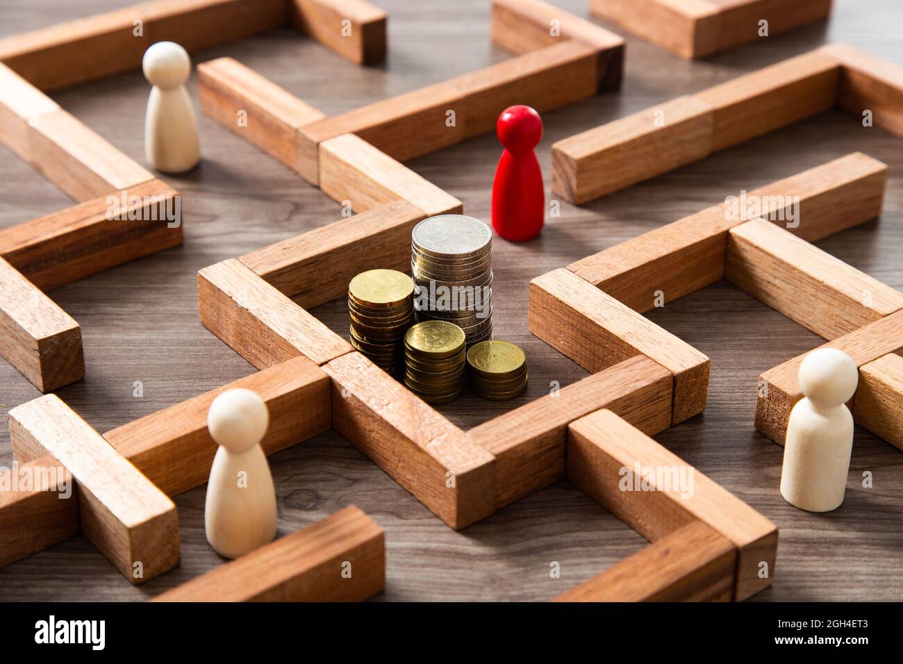 Group of coins heaps in the maze game built by wood blocks, find a way ...