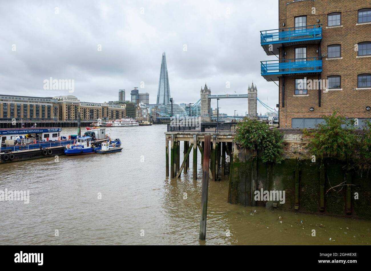 View of the London from the Thames Path at St Katherine Way Wapping ...