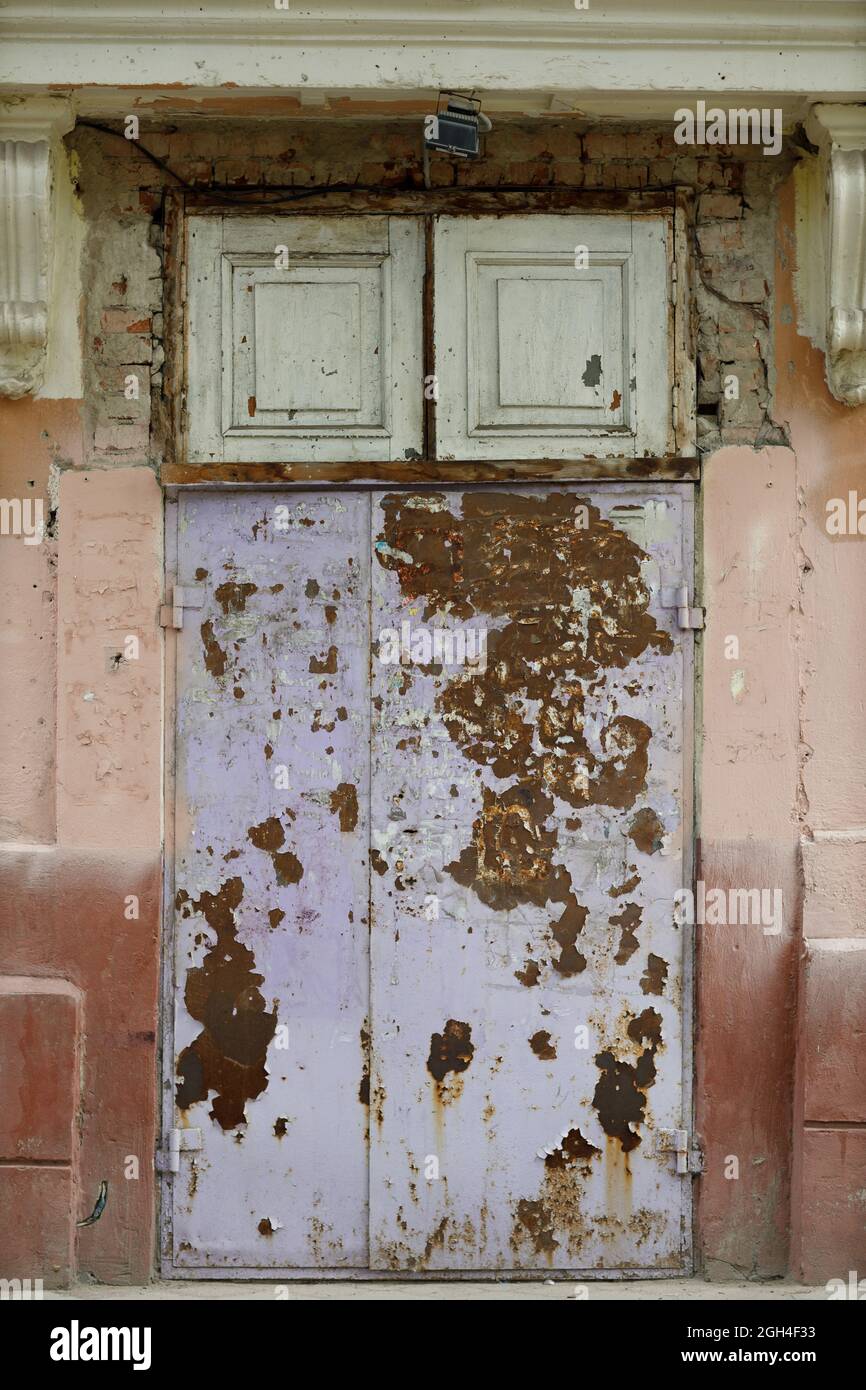 Old rusty heavy iron metal vintage painted shabby door Stock Photo - Alamy
