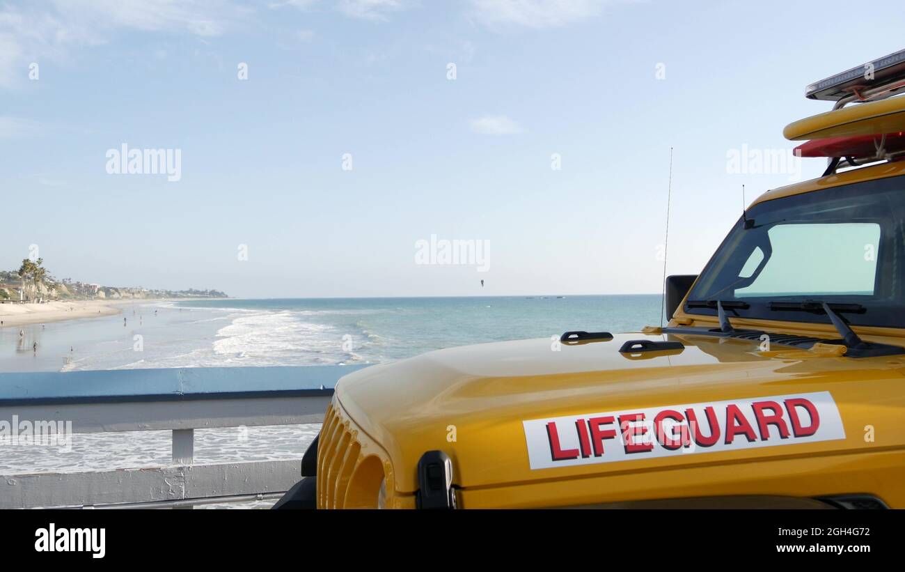 Yellow lifeguard car, San Clemente beach pier, California USA ...