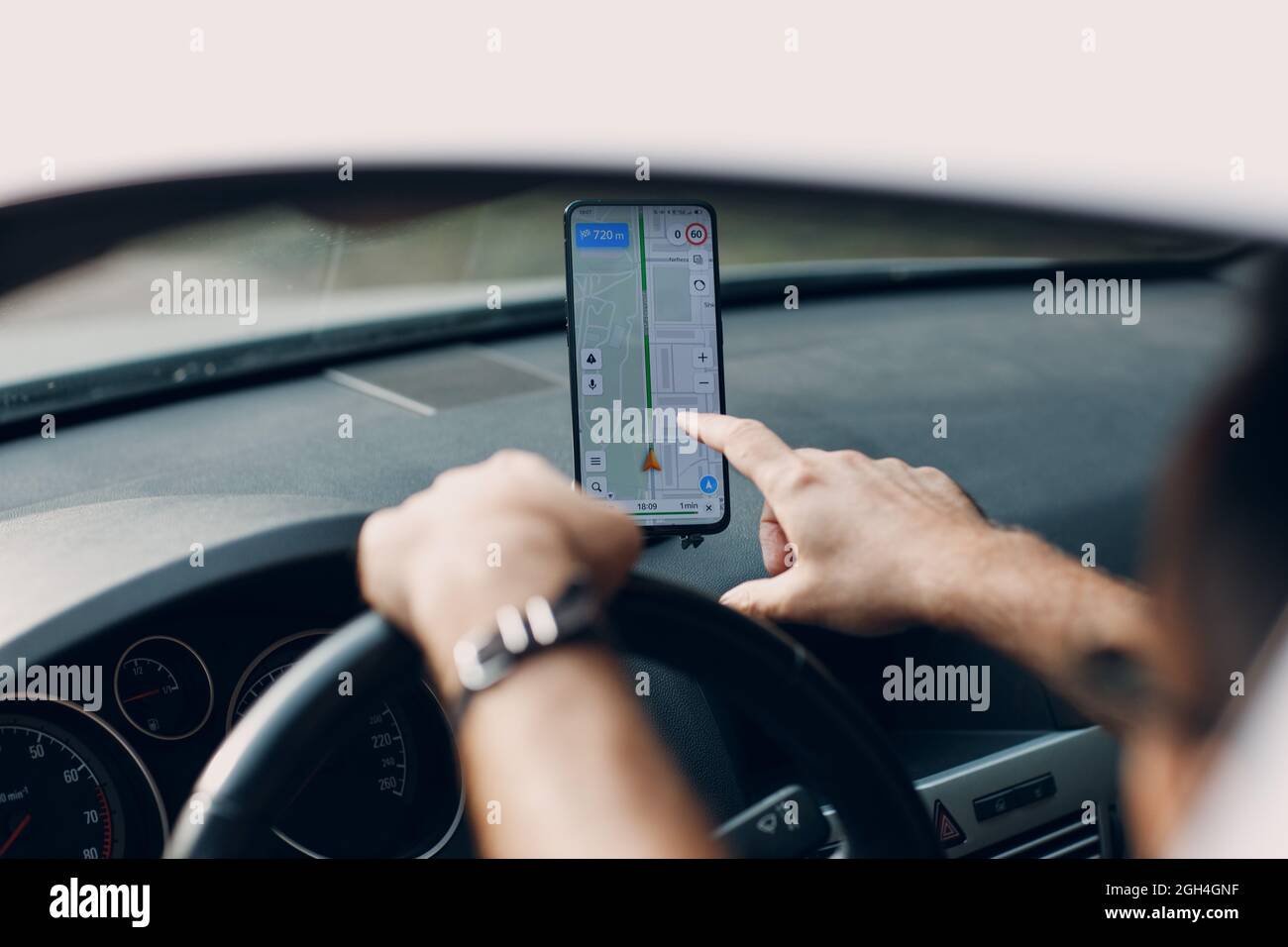 Navigator in car vehicle transportation commuter. Driver man using ...