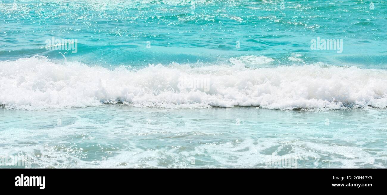 Beautiful summer beach and sea waves Stock Photo - Alamy