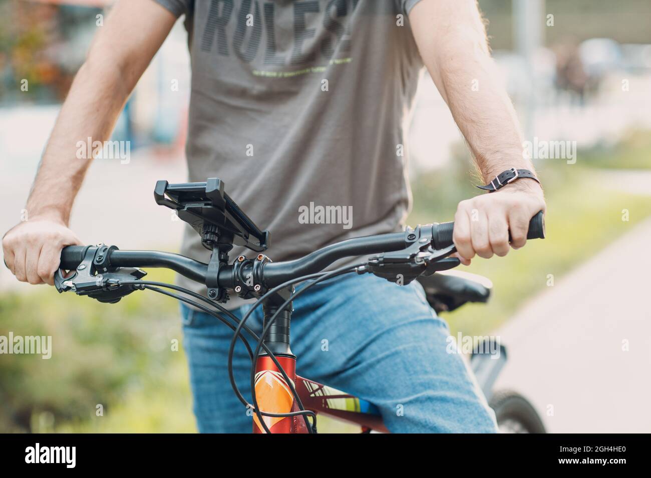 Man planning route using GPS navigation application in mobile phone on ...