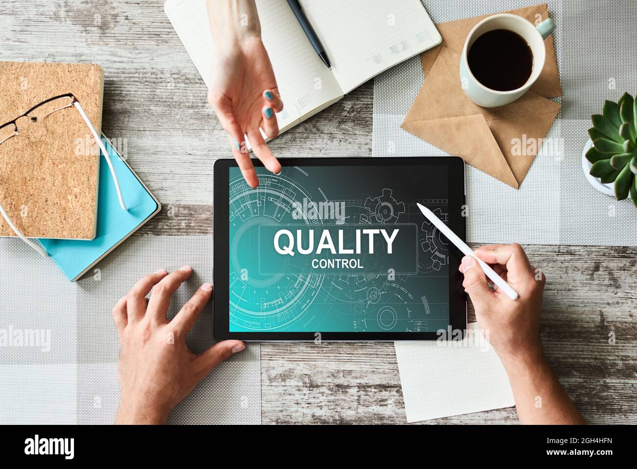 Quality control concept on device screen. Business and technology ...