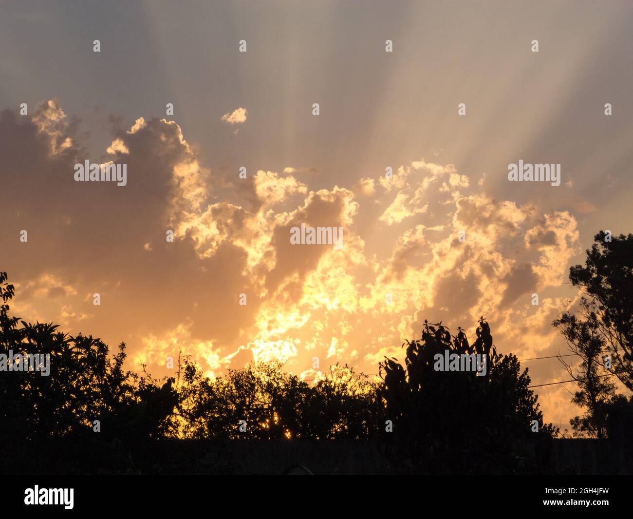 A mesmerizing view of a scenic sunset at golden hour Stock Photo - Alamy