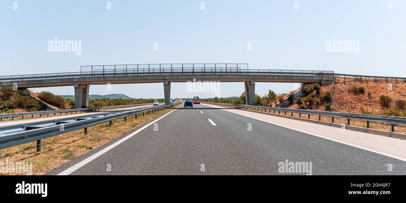 Highway bridge and cars on the road Stock Photo - Alamy