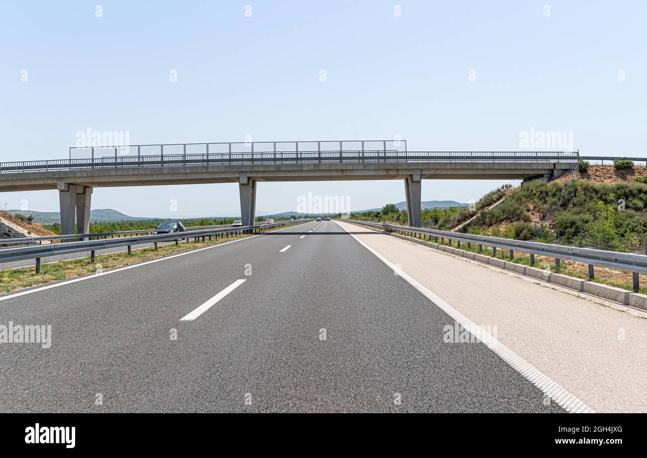 Highway bridge and cars on the road Stock Photo - Alamy