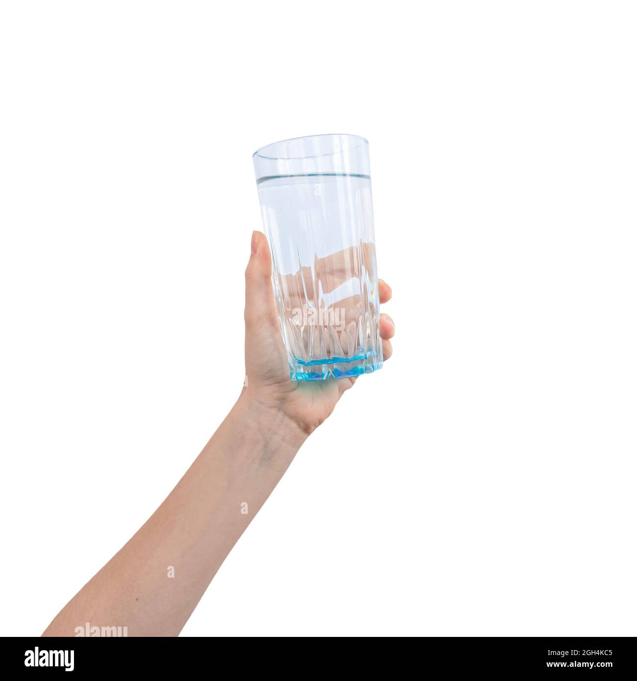 Glass of water isolated on a white background, hand with glass of fresh ...