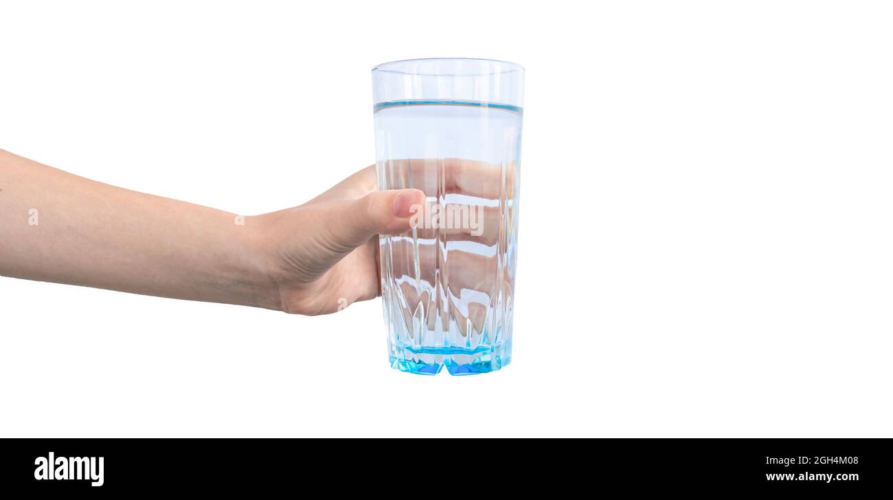 Female hand with glass of water isolated on a white background photo ...