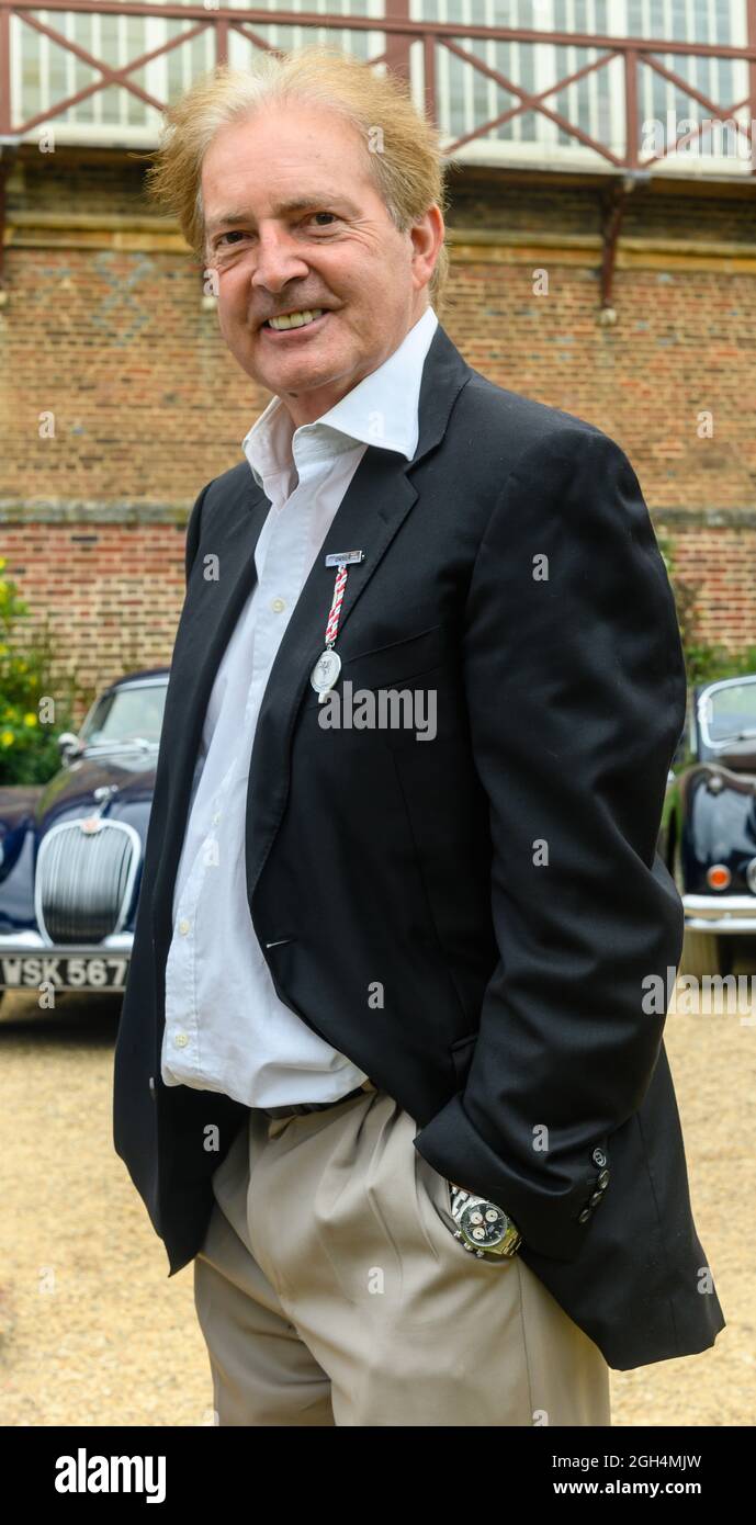 Ian Andrews enjoying the Concours of Elegance 2021 Stock Photo - Alamy