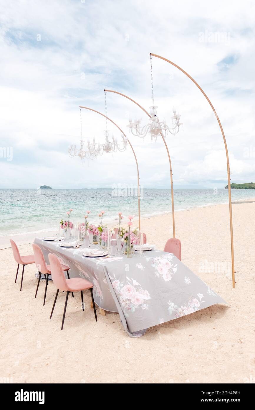 Romantic Wedding Setup at the beach Stock Photo - Alamy