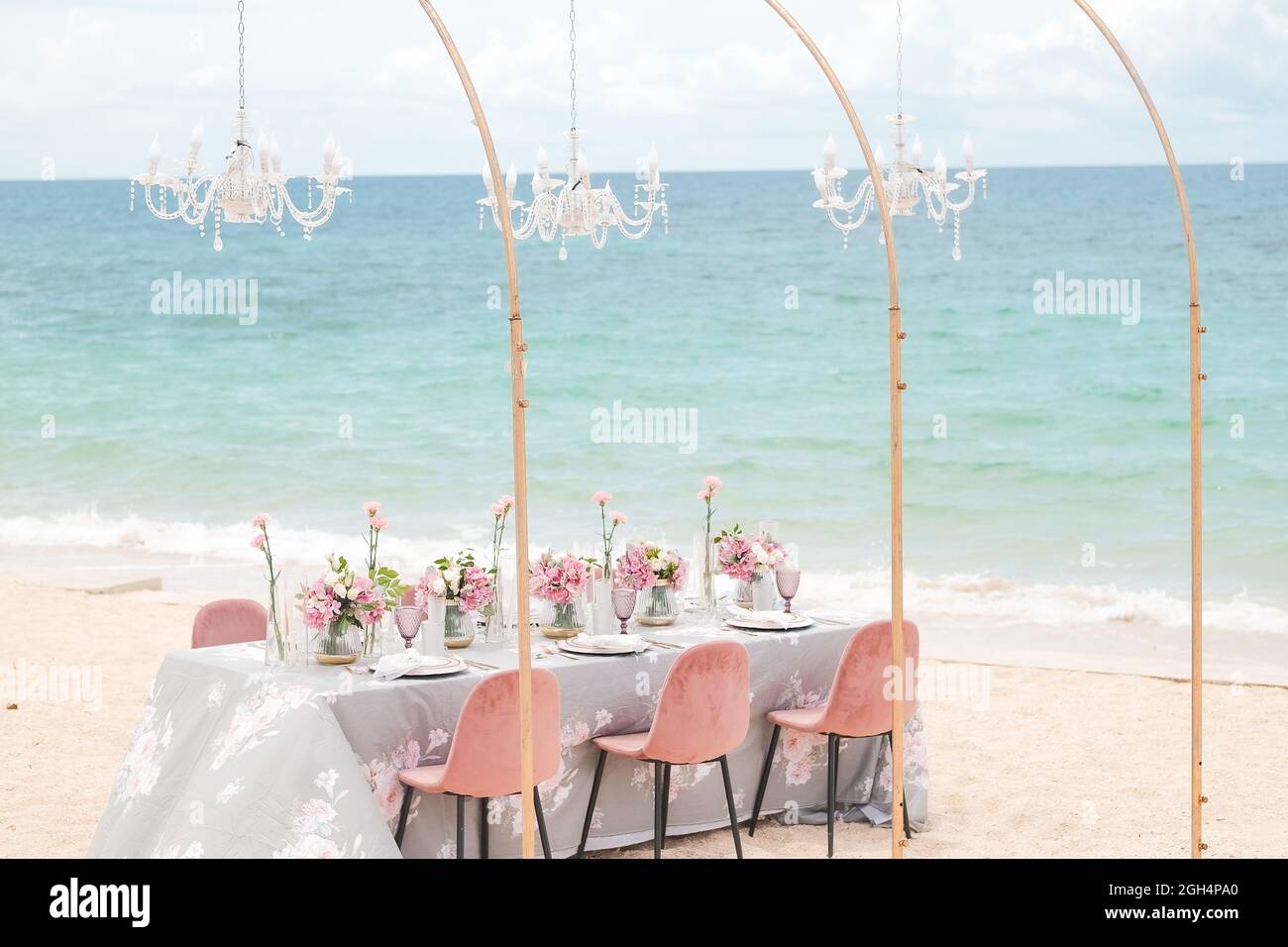 Romantic Wedding Setup at the beach Stock Photo - Alamy
