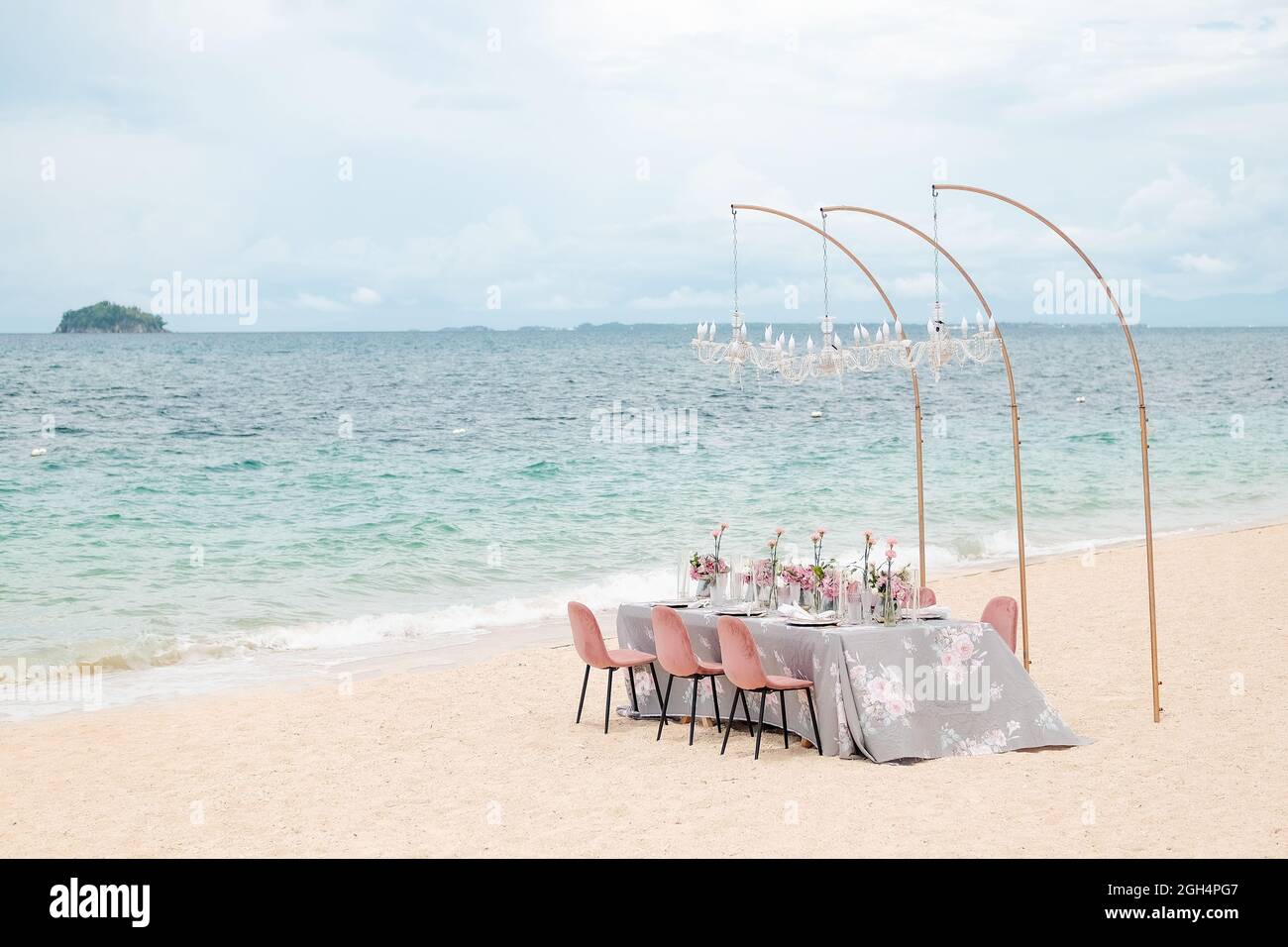 Romantic Wedding Setup at the beach Stock Photo - Alamy