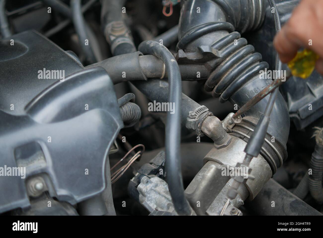 working and repair on car engine Stock Photo - Alamy