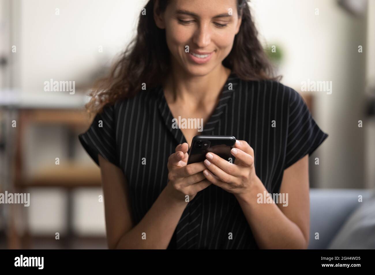 Happy shopper woman sitting on hi-res stock photography and images - Alamy