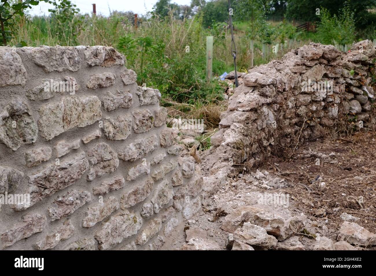 September 2021 - New stone wall being built in a traditional style ...