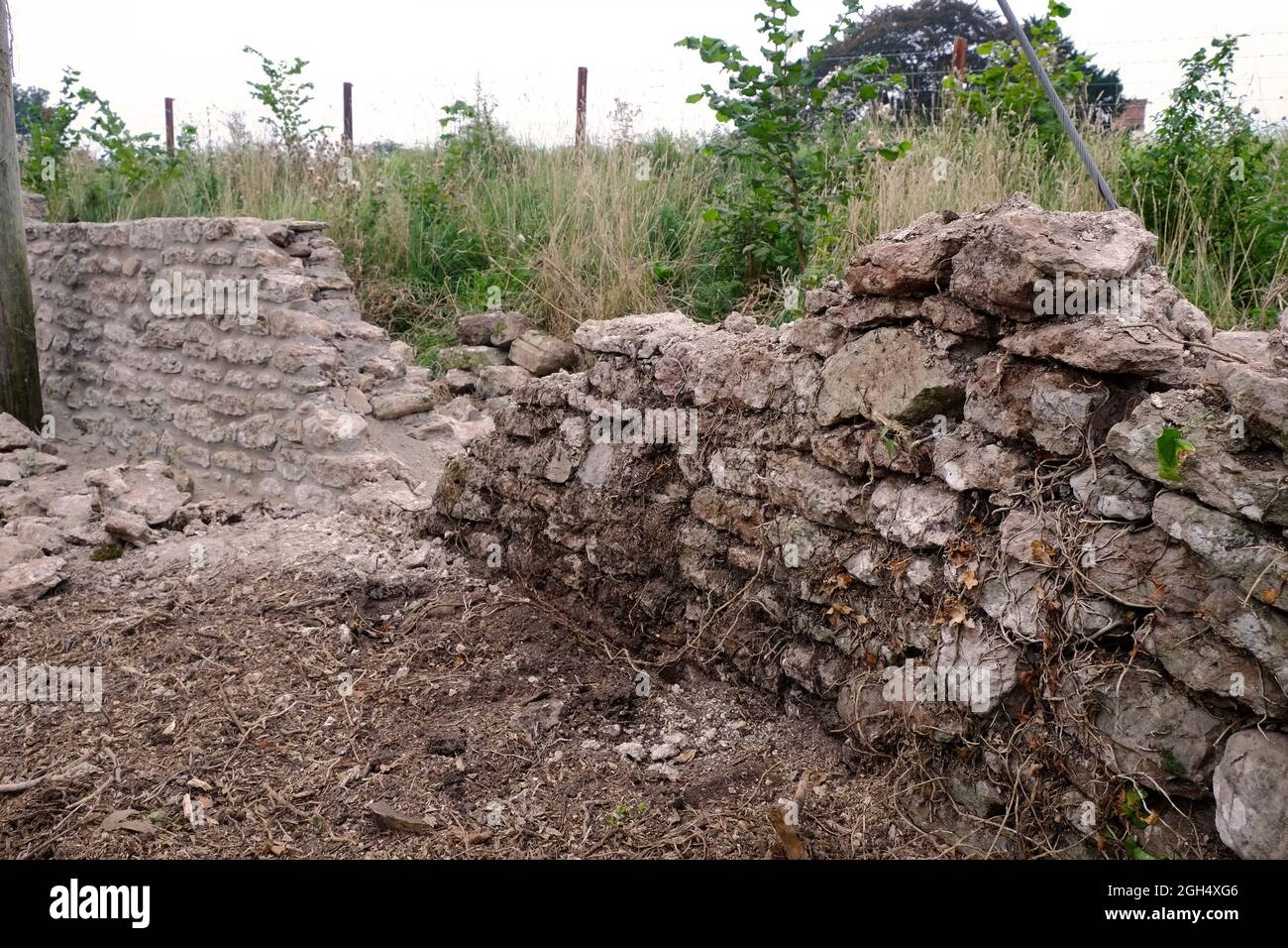 September 2021 - New stone wall being built in a traditional style ...
