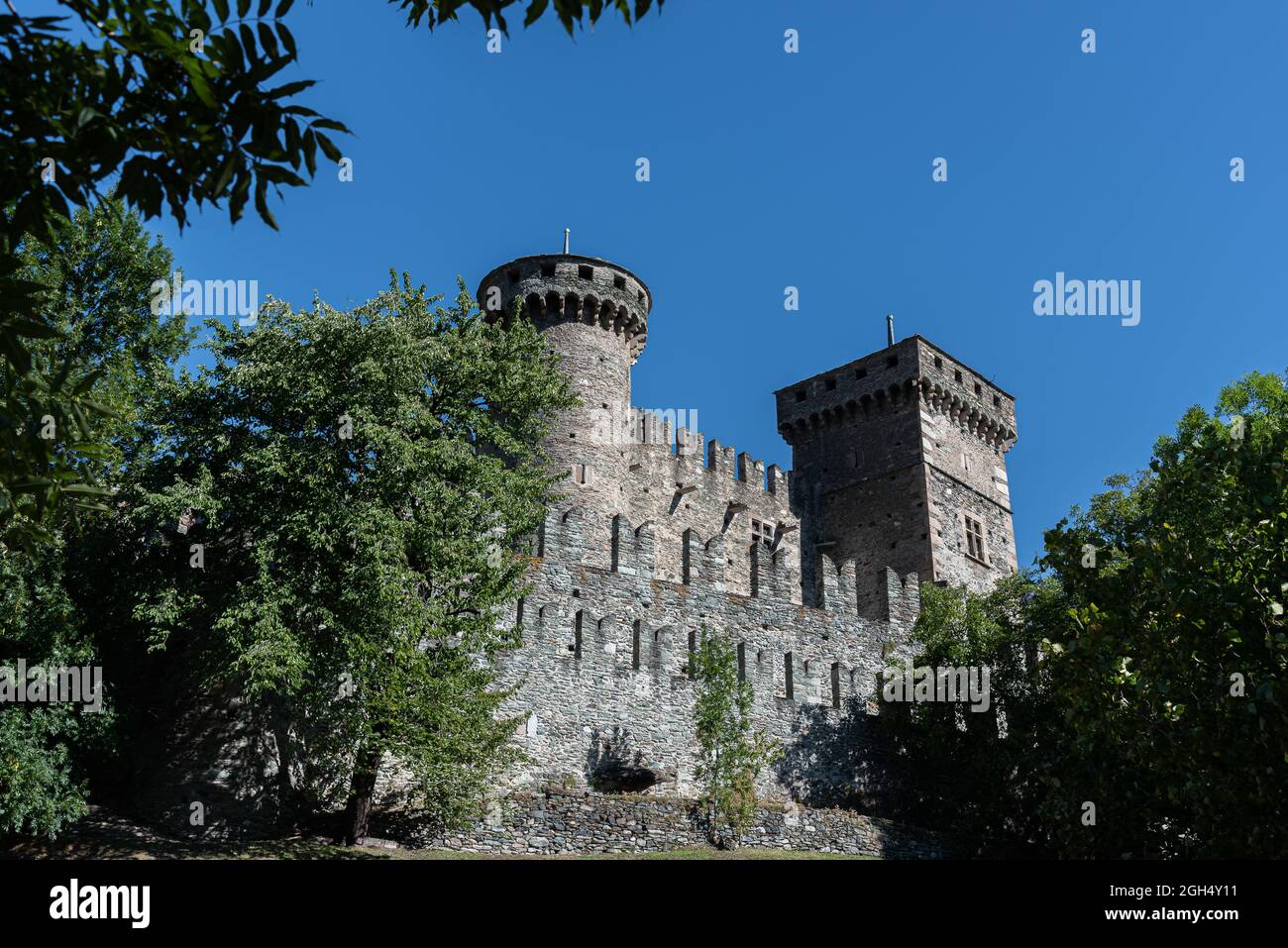 The castle of Fénis, located in the municipality of the same name, is ...
