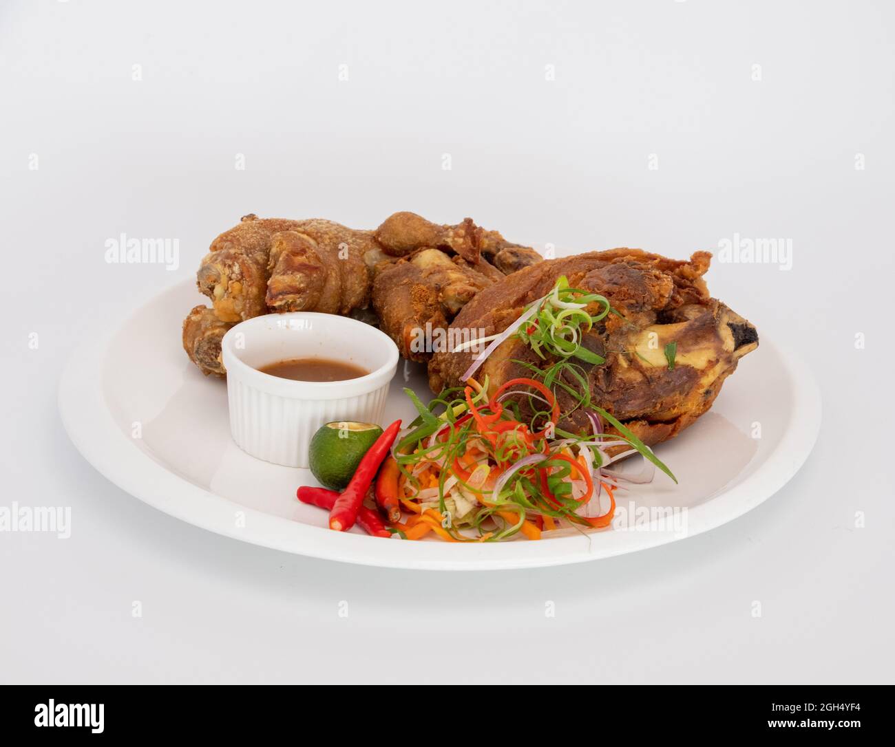 crispy pata, deep-fried pork knuckle Stock Photo - Alamy