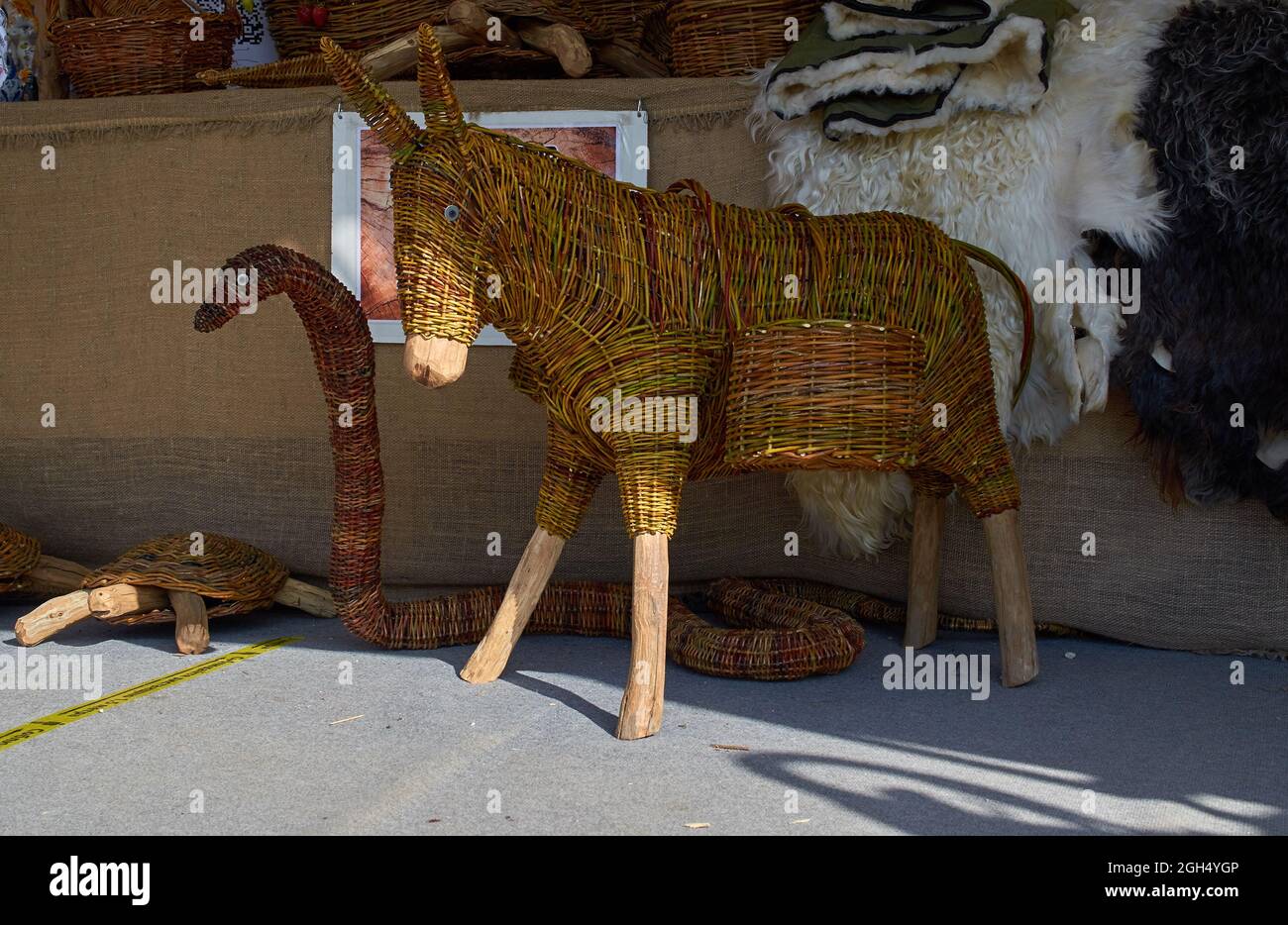 Wicker animal figures. Donkey, snake and turtle. Garden figures Stock ...