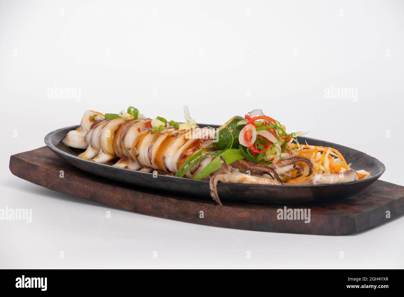 Sizzling grilled squid hi-res stock photography and images - Alamy