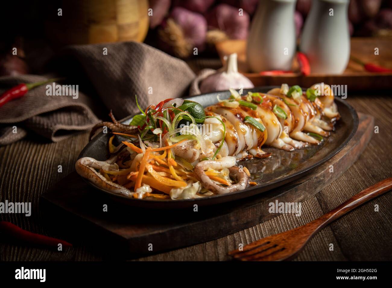 Sizzling grilled squid hi-res stock photography and images - Alamy