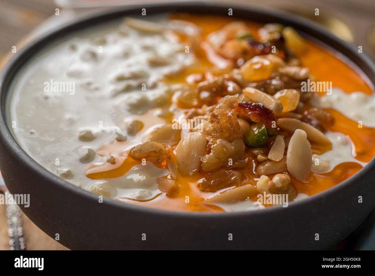 Close up Ashure or Noah's pudding is an islamic dessert made of grains ...